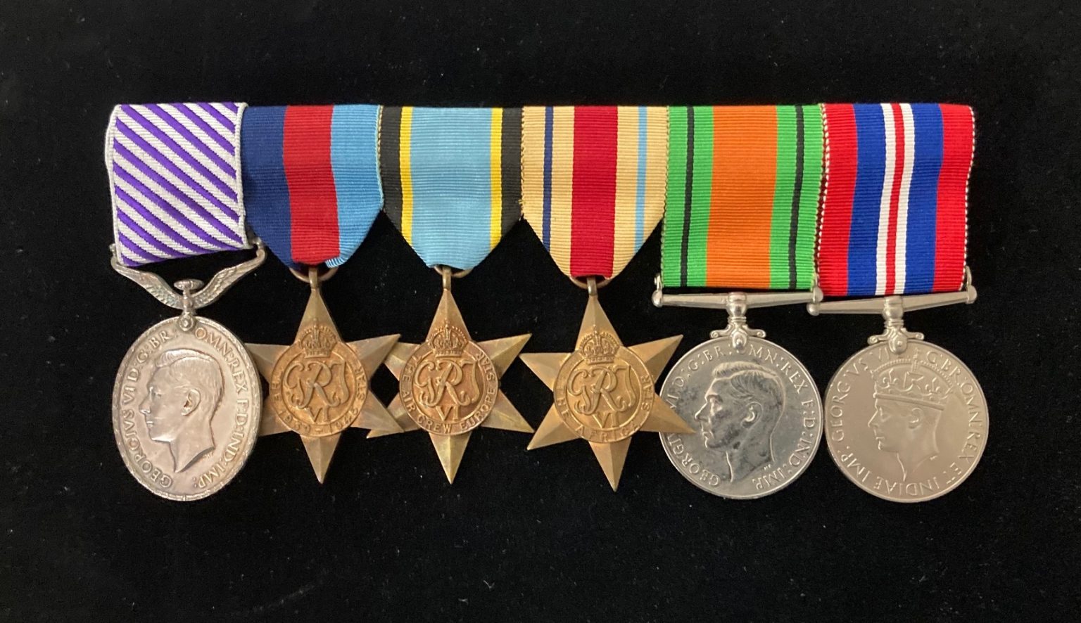 Distinguished Flying Medal group with Log Book, (57 ops.) a fine ...